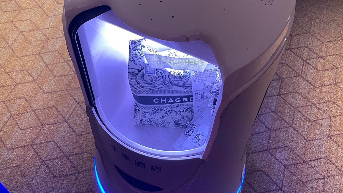 Chinese Hotel's Robot Room Service Goes Viral! See the Incredible Video Now